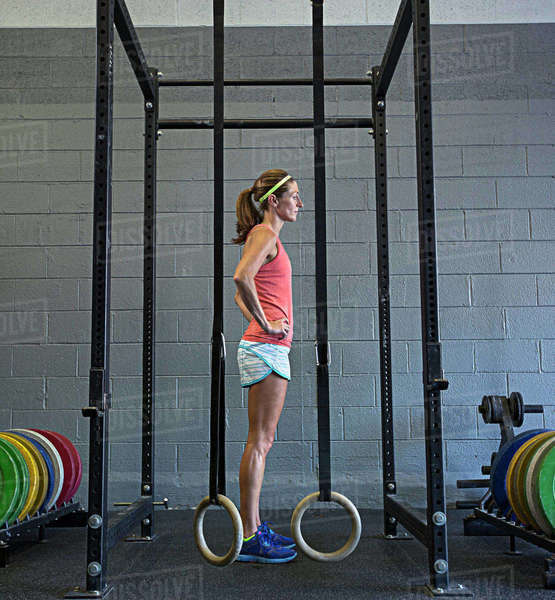 Caucasian athlete standing in gym - Royalty-free Stock Photo | Dissolve