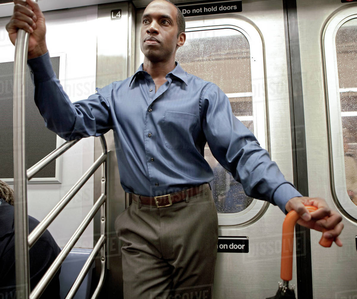 African American businessman on subway train - Royalty-free Stock Photo ...