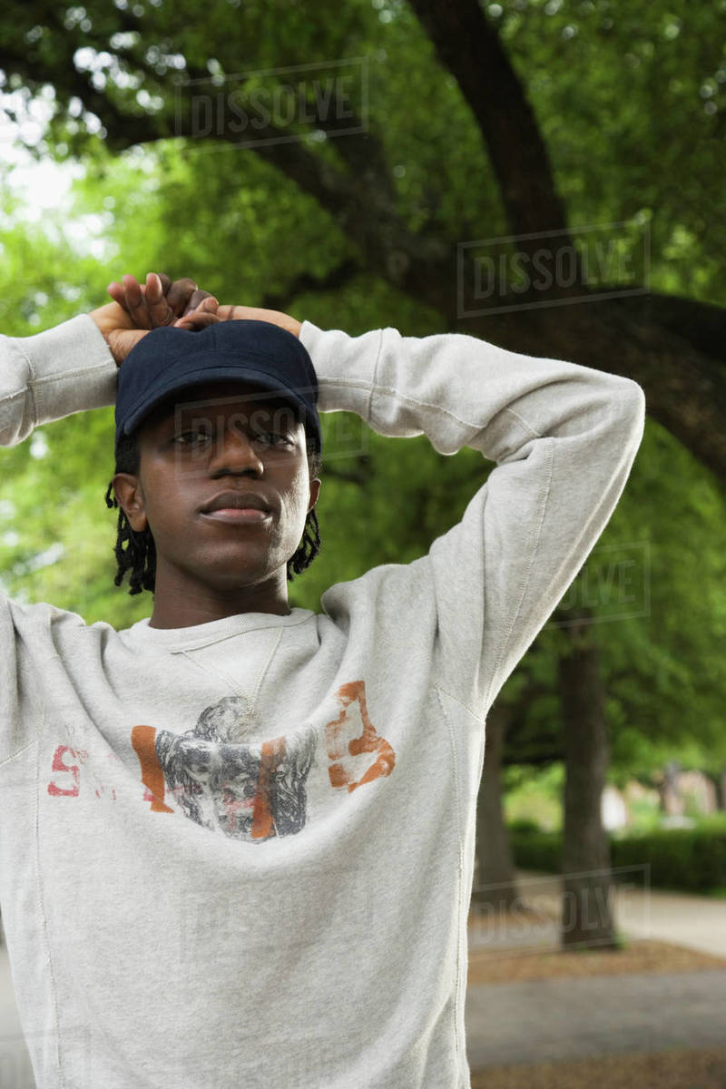 Serious Black man wearing cap - Stock Photo - Dissolve