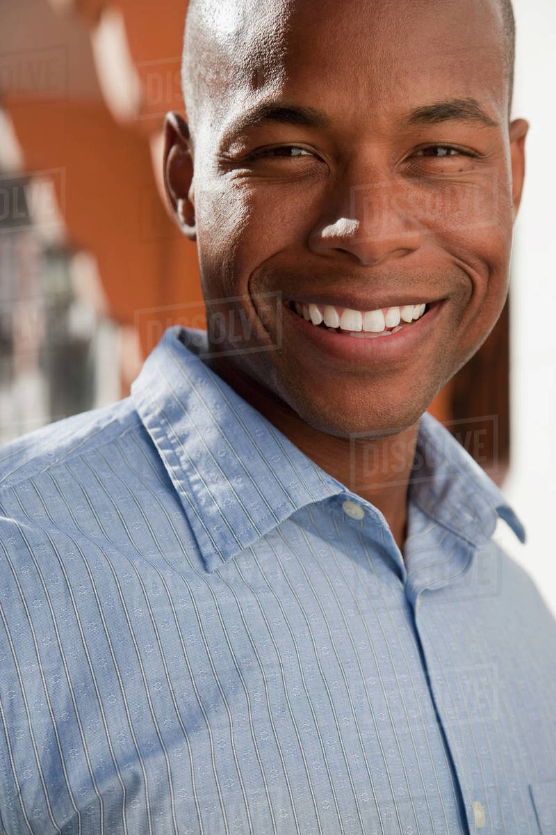 Smiling Black man - Royalty-free Stock Photo | Dissolve