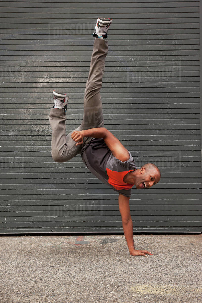 African American man break dancing on city sidewalk - Royalty-free ...
