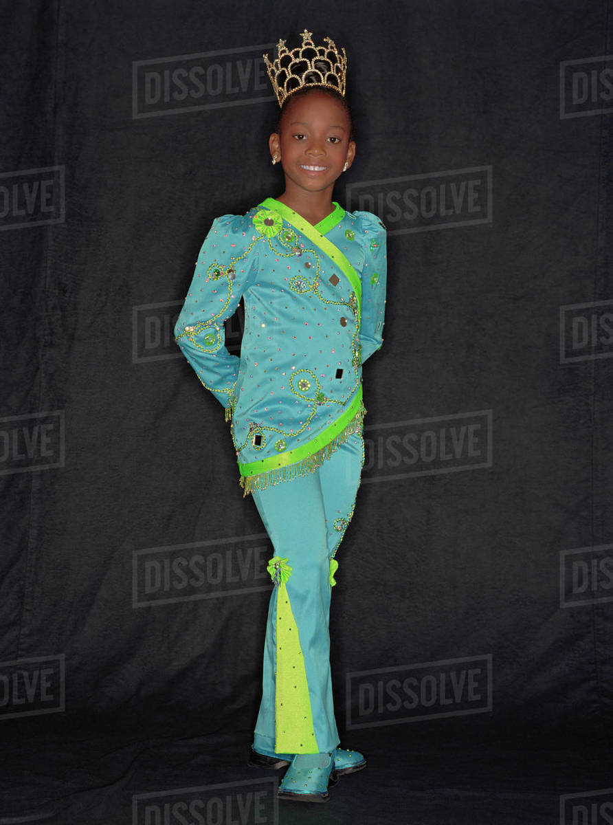African girl in pageant costume and crown - Stock Photo - Dissolve