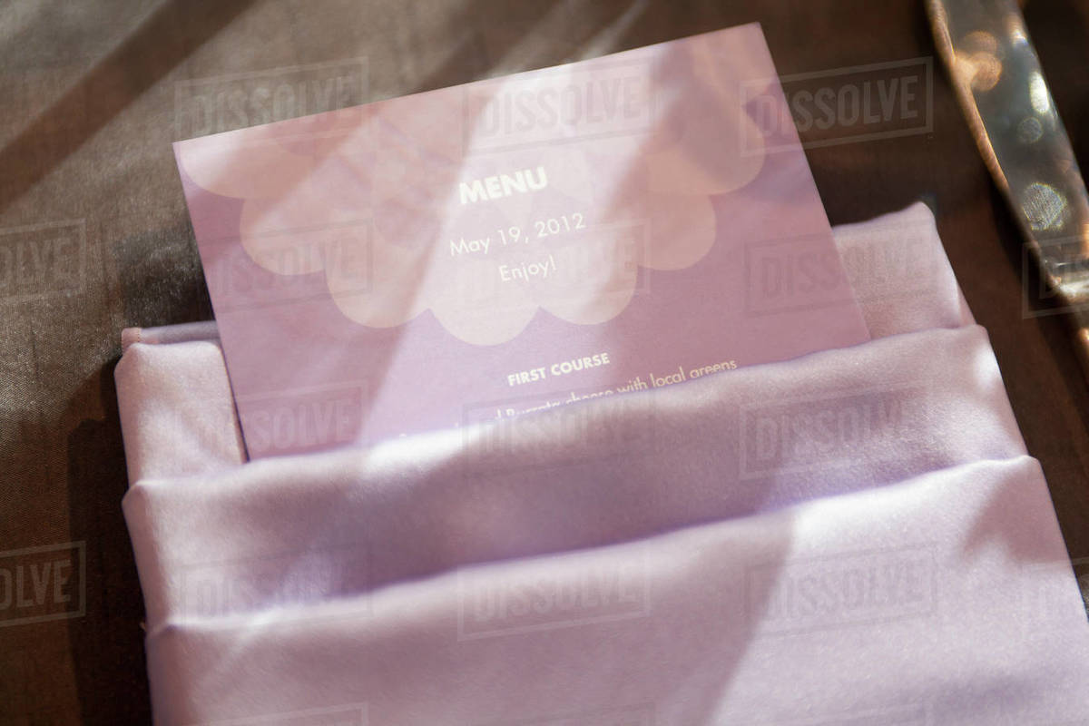Overhead close up of a menu at a formal dinner party - Royalty-free ...