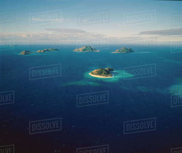 Aerial of a group of Pacific Atolls - part of the Fiji Island Group ...