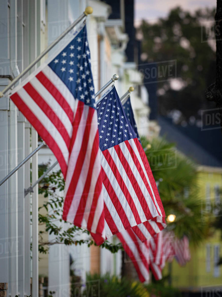 American flags fly on small town street - Royalty-free Stock Photo ...