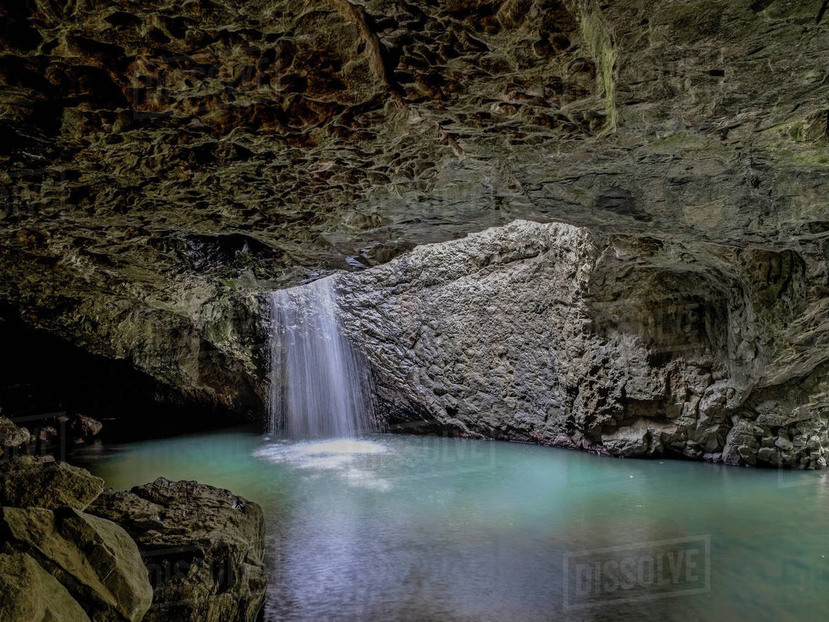 Water flowing into pool at the Natural Bridge in the Gondwana ...