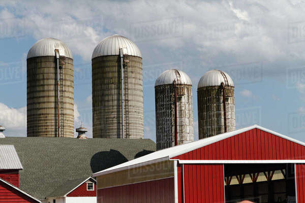 USA, New Jersey, Hunterdon County, Grain storage towers at farm ...