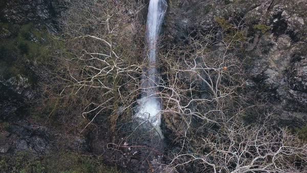 Top view on waterfall between mountains, aerial shooting, amazing ...