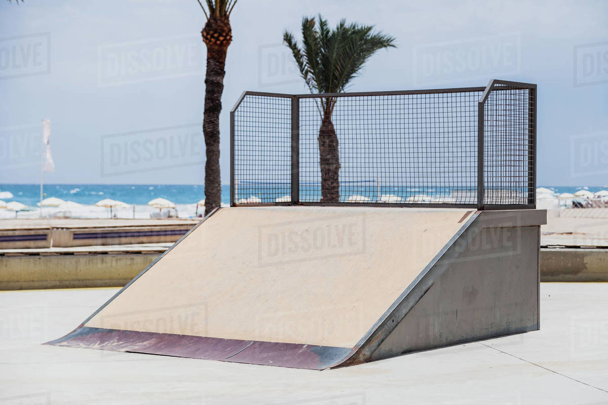 Empty skate park ramp outdoor in seaside beach - Stock Photo - Dissolve