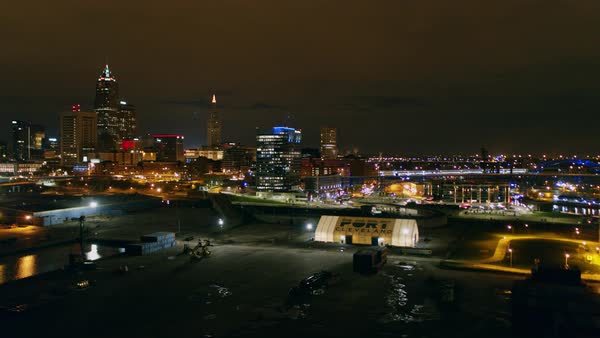 Cleveland Ohio Aerial - Panning around at night near industrial ...