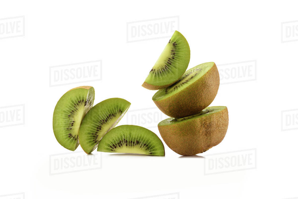 close up view of arranged fresh kiwi fruits isolated on white - Stock ...
