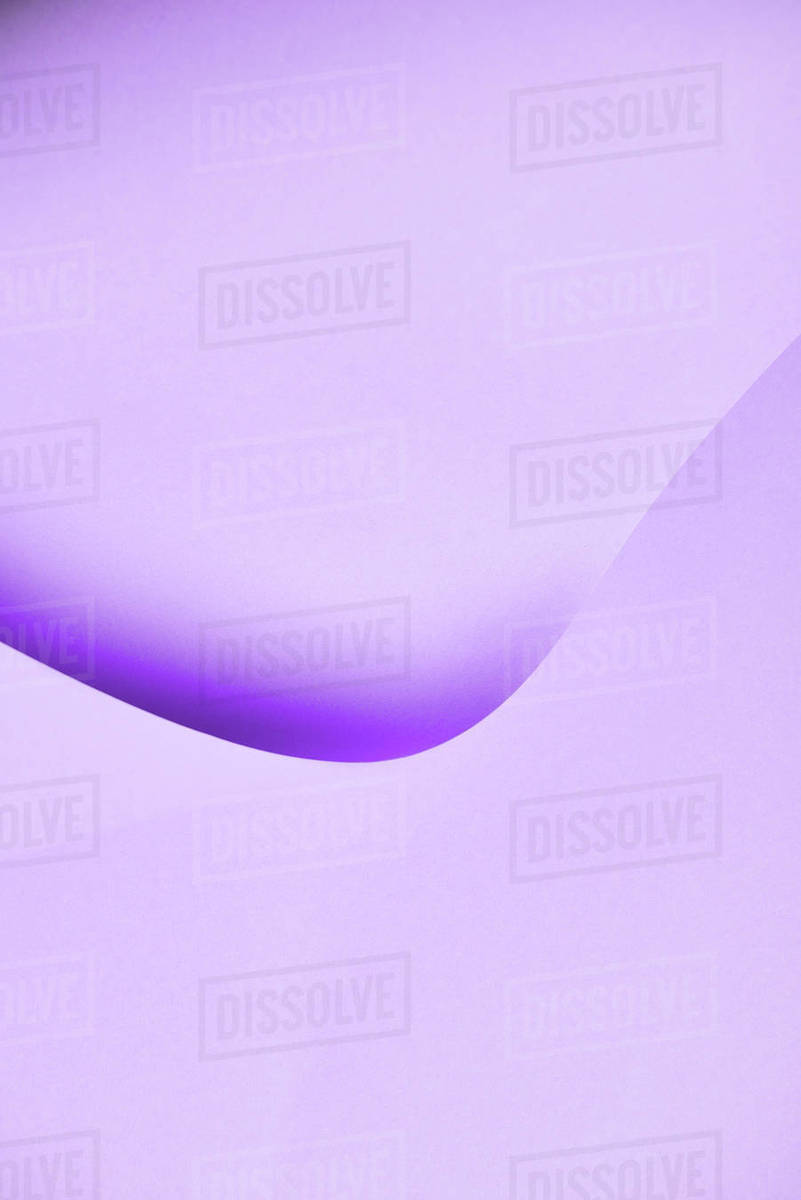 Close-up view of beautiful abstract light violet paper background ...