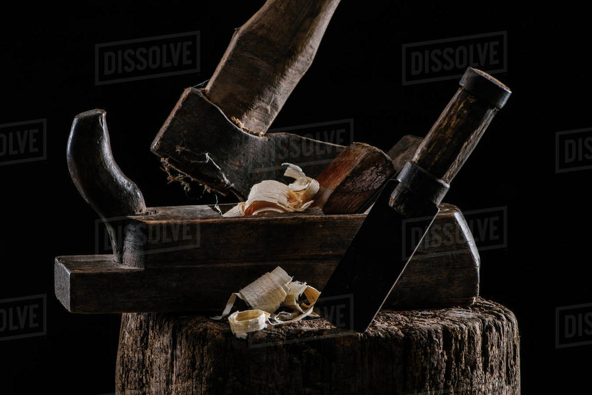 Close up view of woodworker plane, axe and chisel carpentry tools on ...