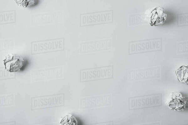 top view of messy crumpled papers on white surface - Royalty-free Stock ...