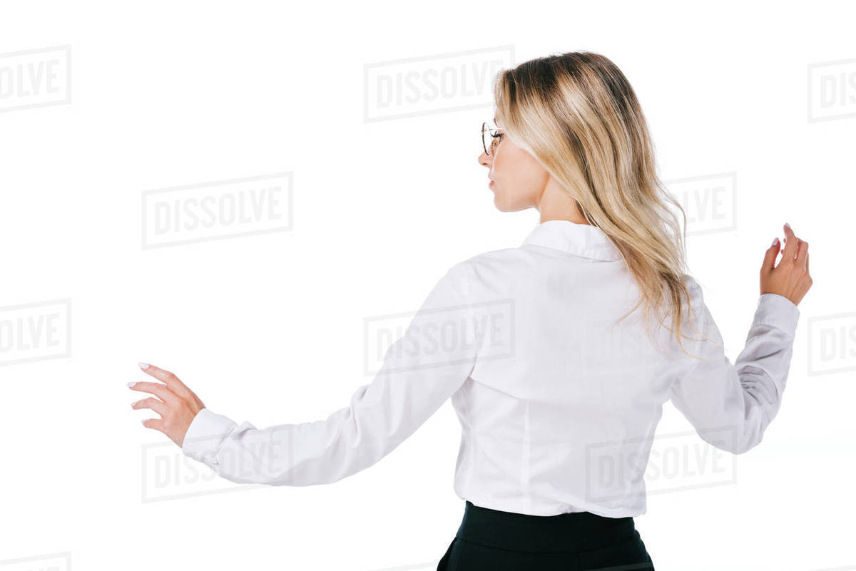 Back view of businesswoman gesturing isolated on white - Royalty-free ...