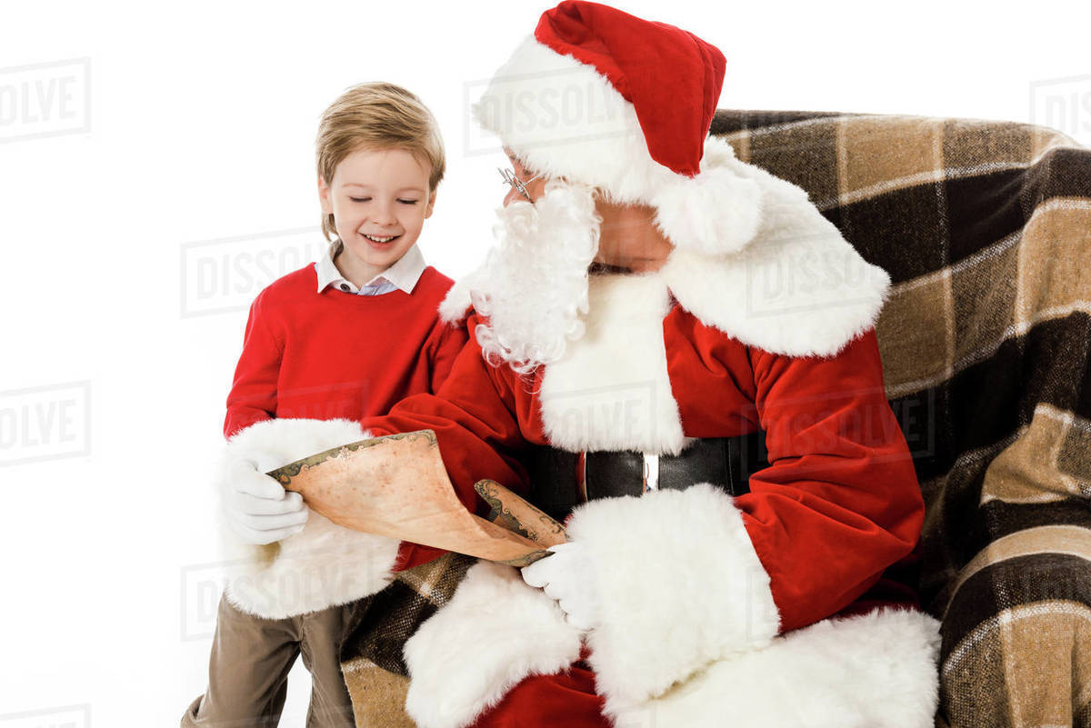 Santa and happy kid reading letter together isolated on white - Stock ...