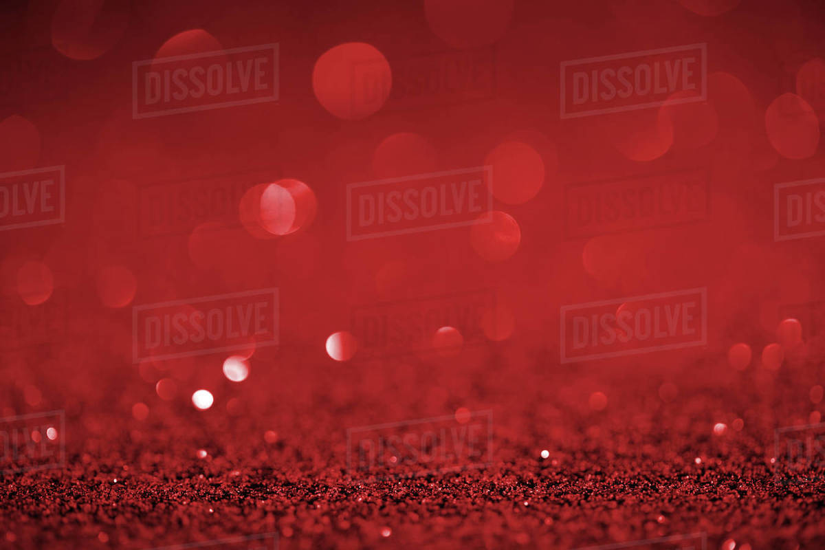 Abstract red glitter with bokeh on background - Stock Photo - Dissolve