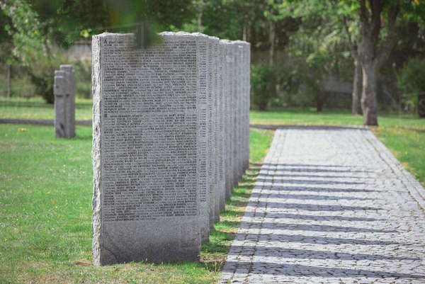 identical tombs with lettering placed in row at graveyard - Stock Photo ...
