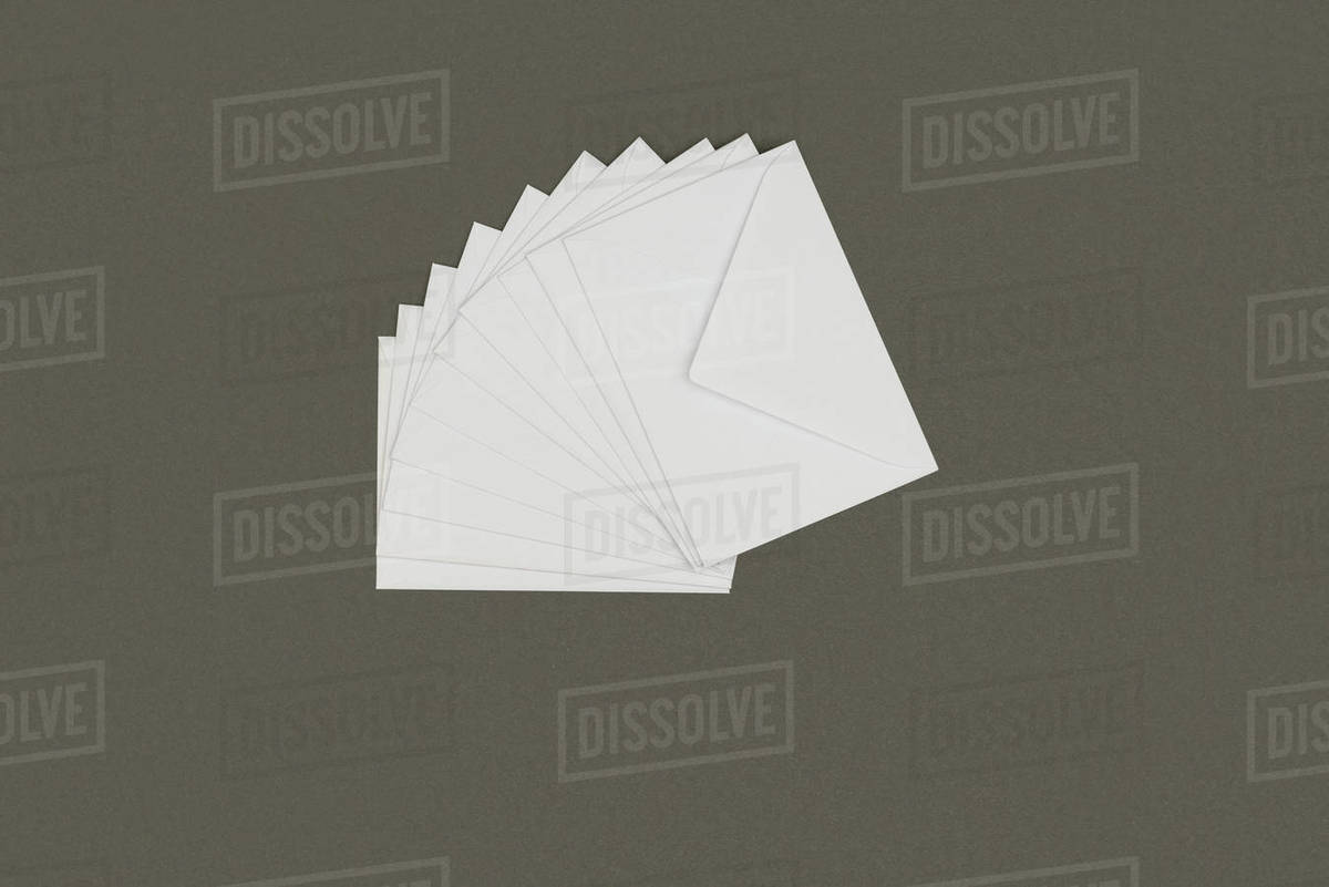 close-up view of white closed letters isolated on grey background ...