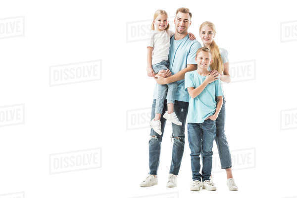 Happy family standing and smiling isolated on white - Royalty-free ...