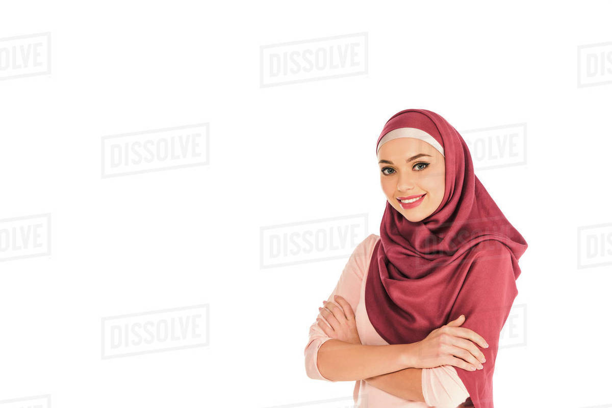 Muslim woman standing with crossed arms isolated on white - Stock Photo ...