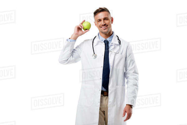 Smiling doctor holding green apple in hand isolated on white, healthy ...