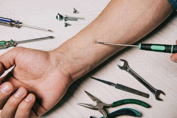 Cropped view of man fixing hand with tools - Royalty-free Stock Photo ...
