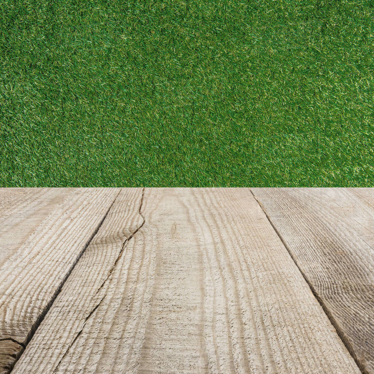 Surface of beige wooden planks with green grass background - Stock ...