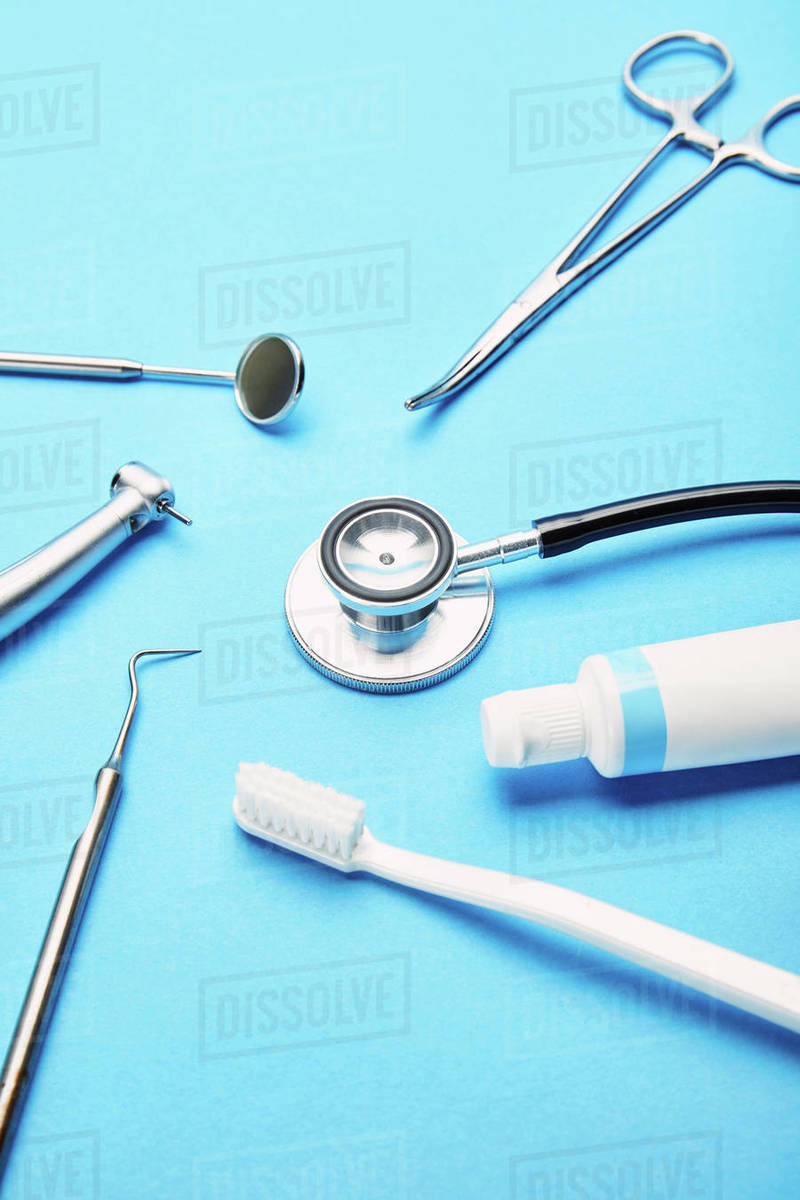 Close up view of arrangement of sterile dental instruments, stethoscope ...