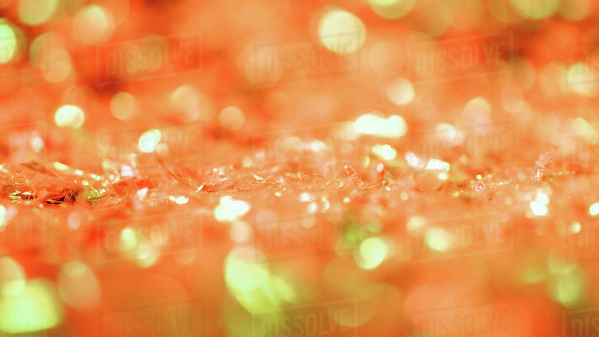 Abstract glowing background with orange glitter and bokeh - Stock Photo ...