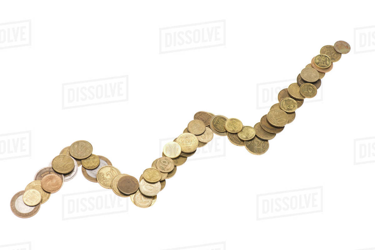 Top view of coins arranged in line isolated on white - Royalty-free ...