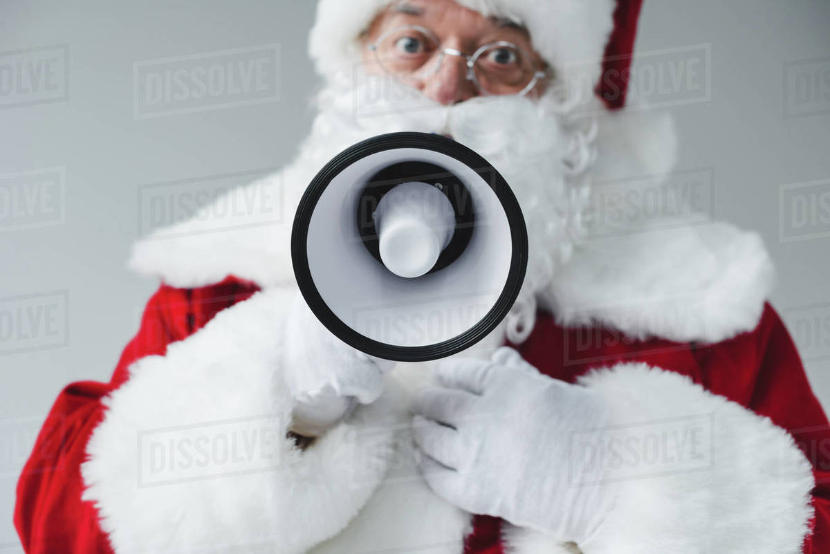 close-up view of santa using megaphone and looking at camera - Royalty ...