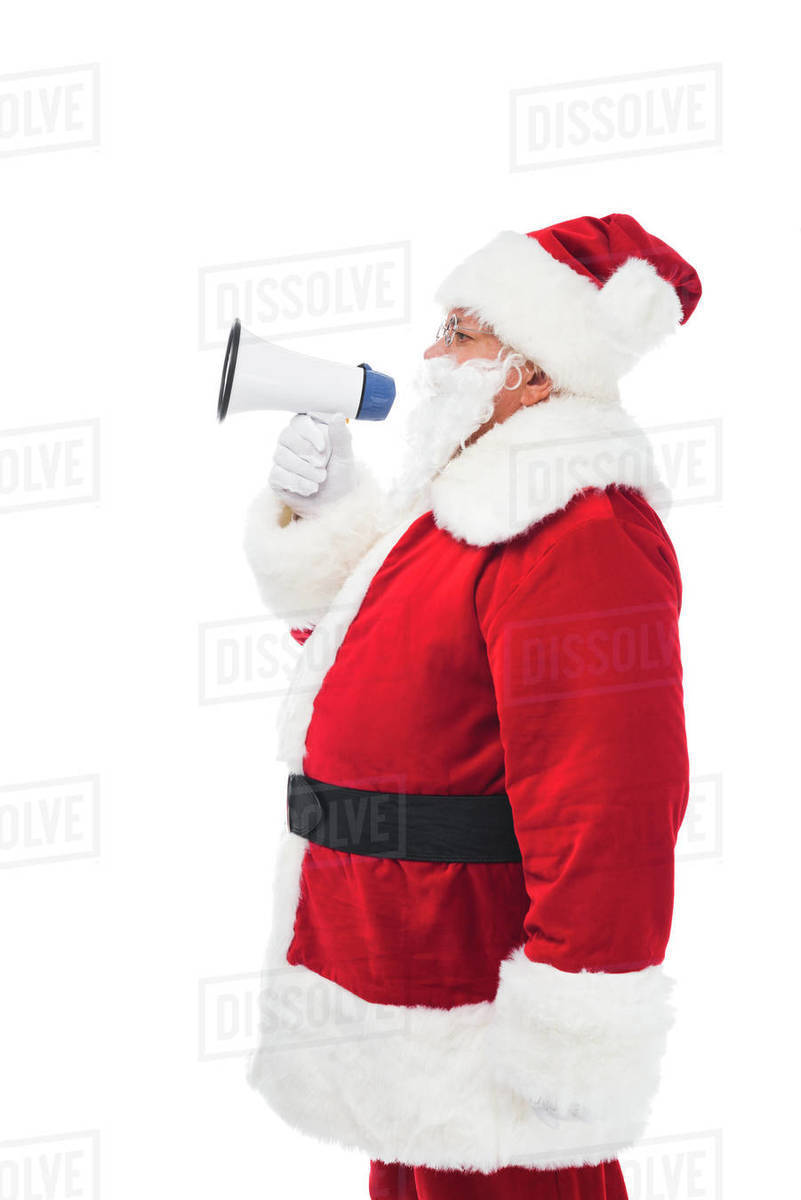 side view of santa using megaphone and looking away isolated on white ...