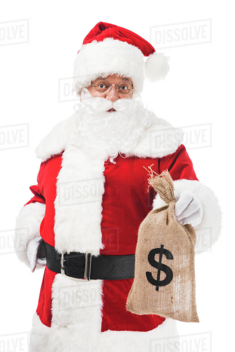 santa claus holding sack bag with money and looking at camera isolated ...