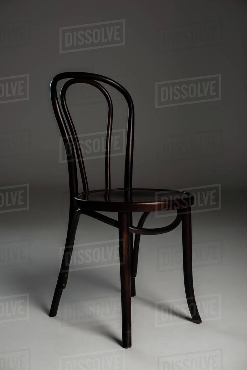 Simple wooden chair, isolated on grey - Royalty-free Stock Photo | Dissolve