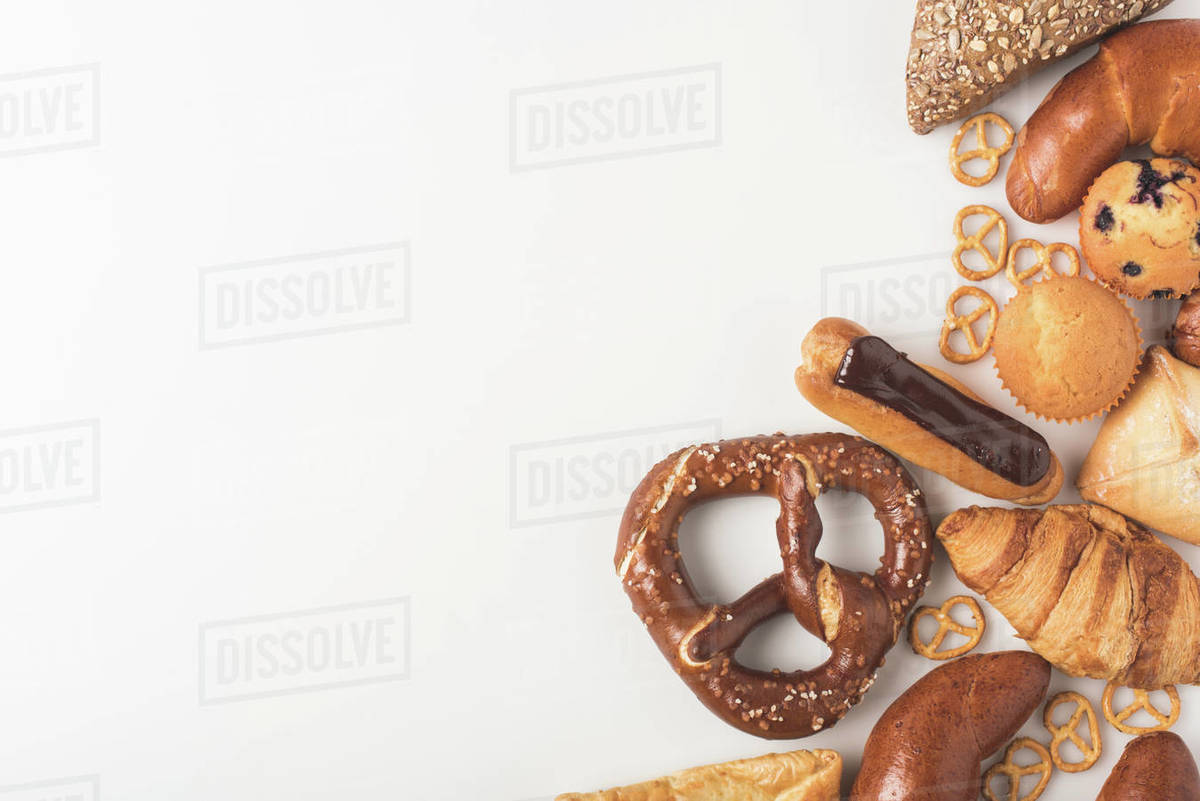 Top view of arranged sweet bakery isolated on white - Royalty-free ...