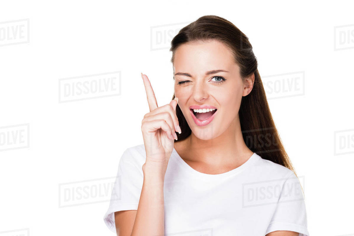 Portrait of charming woman winking at camera isolated on white ...