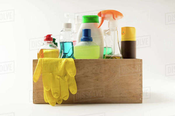 Close-up view of various cleaning equipment in box isolated on white ...