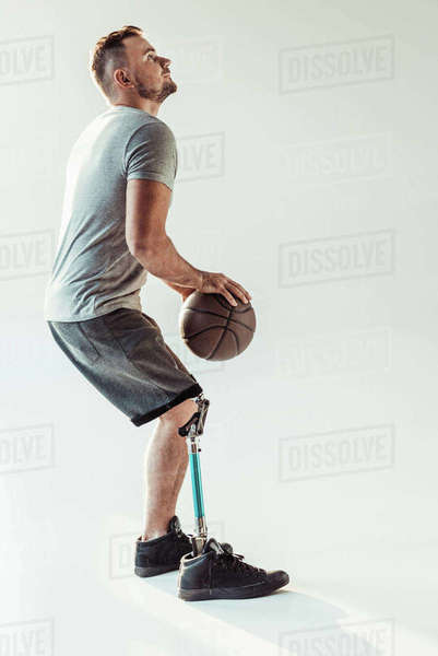 Side view of basketball player throwing basketball ball isolated on ...