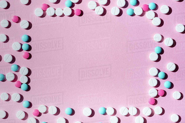 top view of various colorful medical tablets on pink - Stock Photo ...