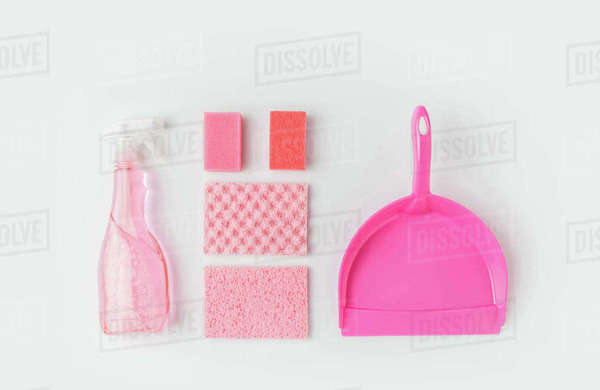 Flat lay with pink washing sponges, bottle and scoop, isolated on white ...