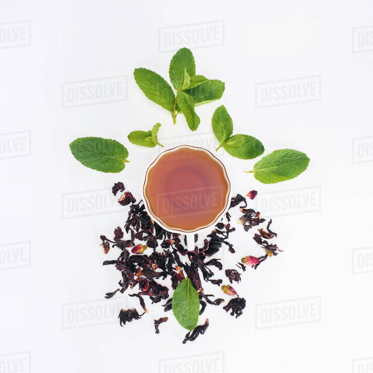 Top view of healthy herbal tea in cup and mint leaves on grey - Stock ...