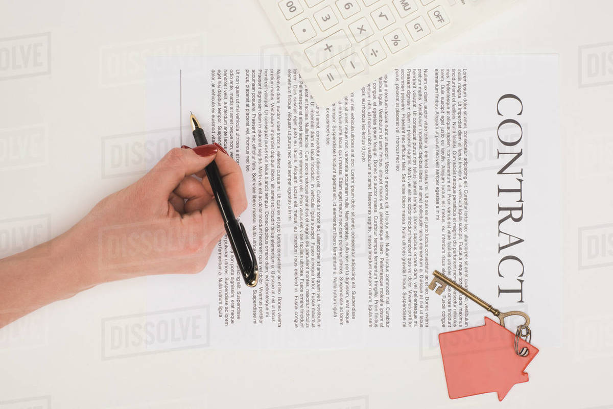 top view of cropped hand signs contract of buying house isolated on ...