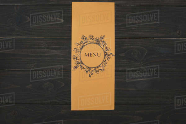 Top view of decorative restaurant menu on wooden table - Stock Photo ...
