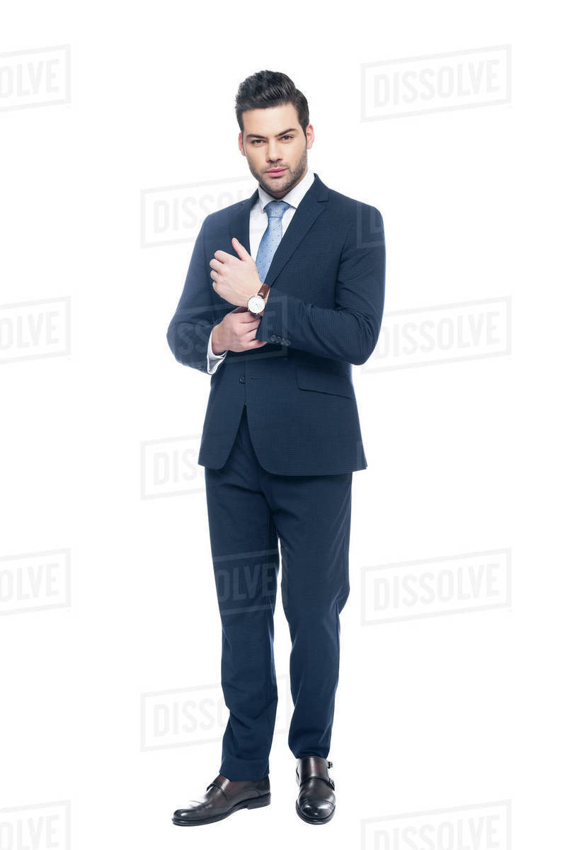 elegant businessman posing in suit, isolated on white - Royalty-free ...