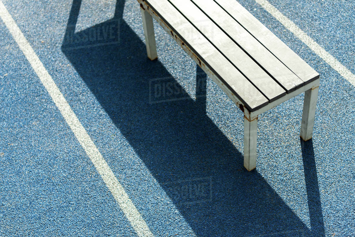 Close up view of bench on running track on Olympic stadium - Royalty ...