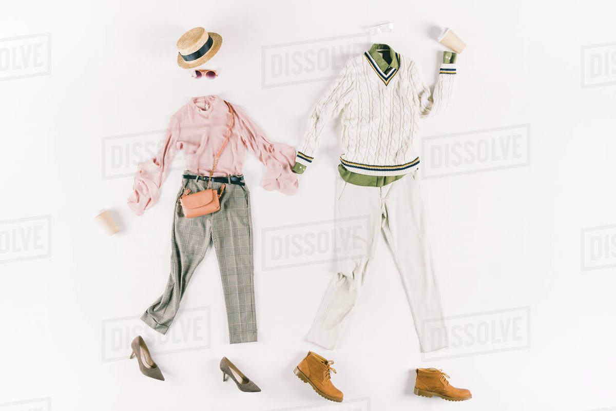 stylish male and female clothes with paper cups isolated on white ...