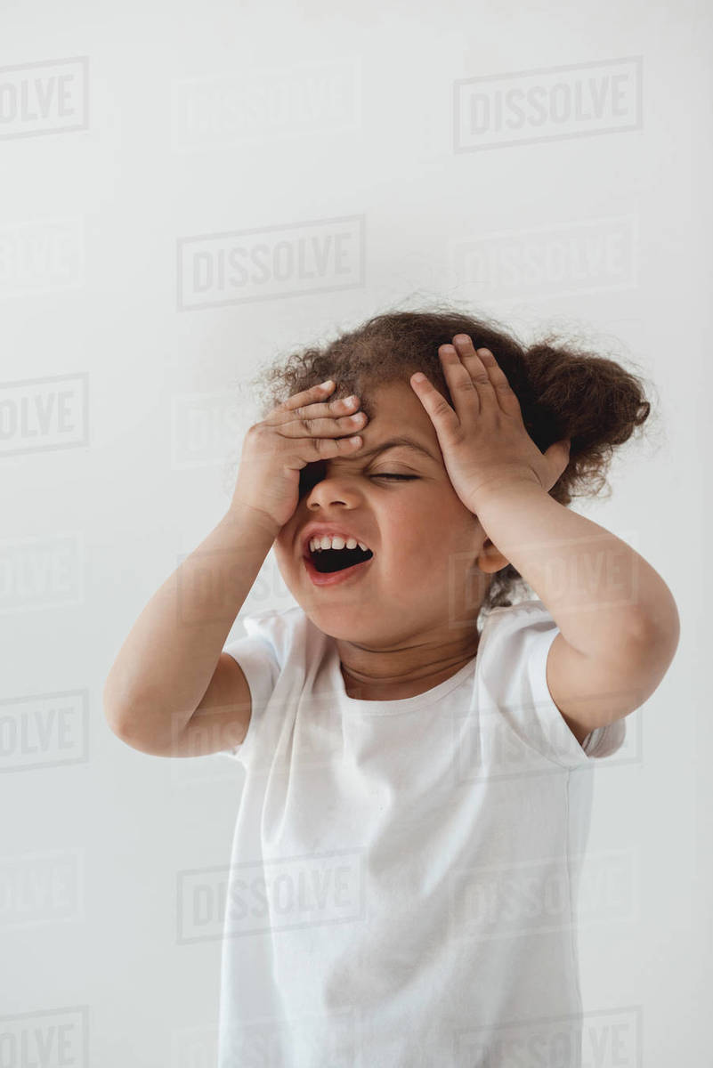 Emotional little kid girl with facial expression isolated on white ...