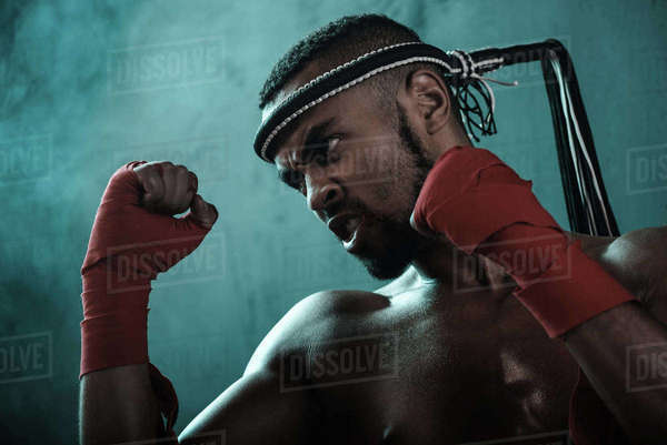 Aggressive young muay thai boxer training thai boxing, ultimate fight ...