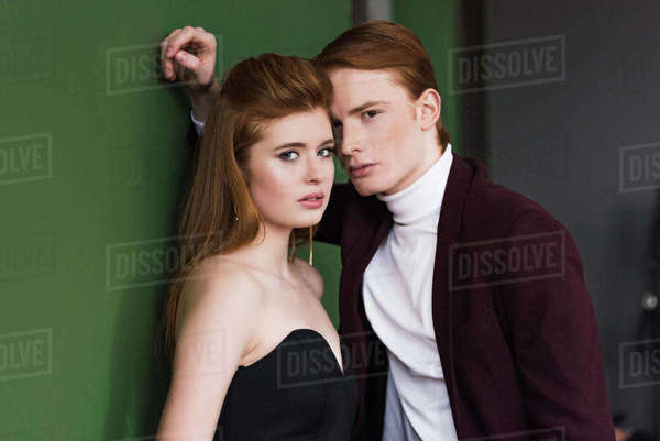 Portrait of fashion models couple dressed in formal wear - Stock Photo ...